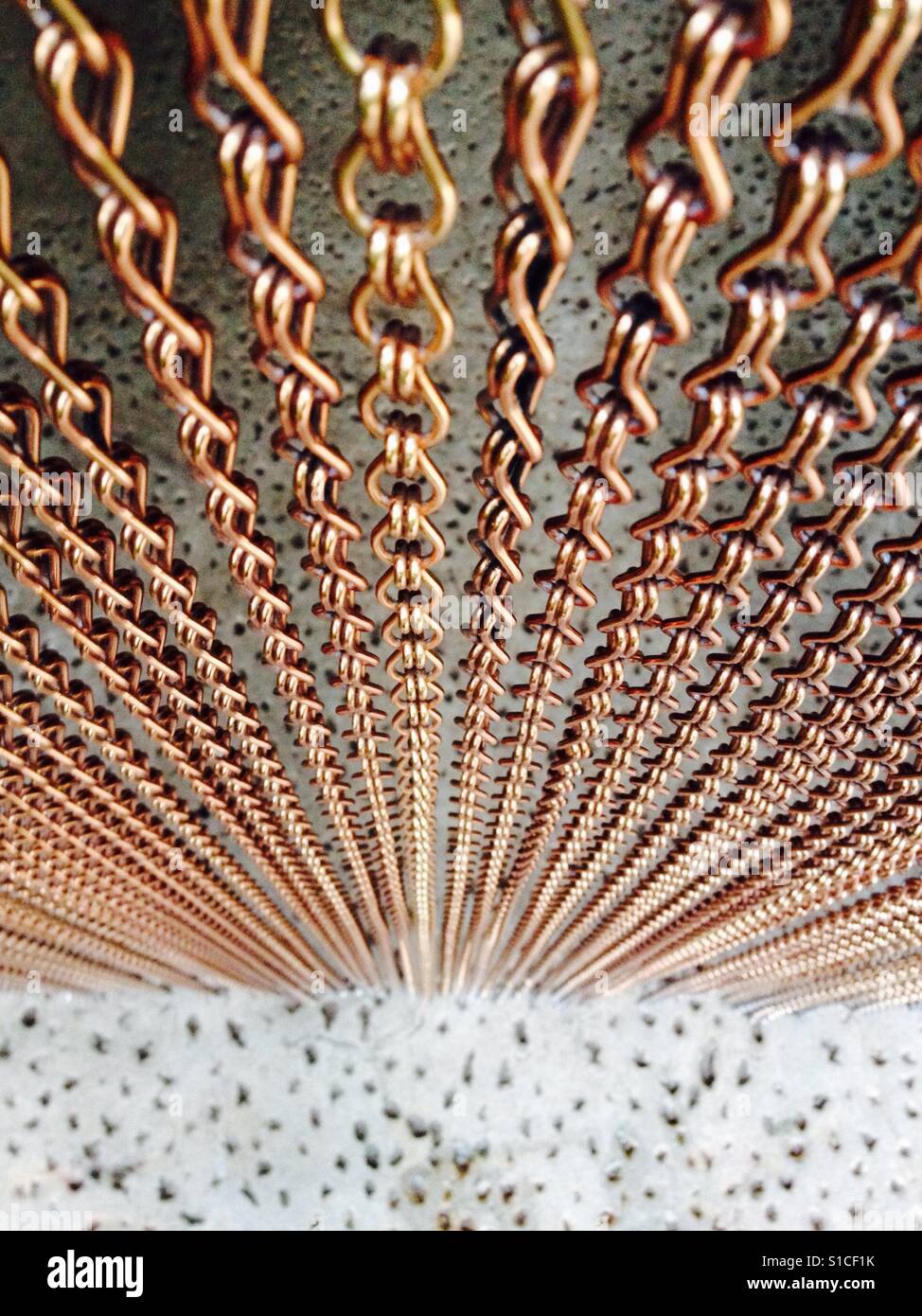 Chains optical illusion concrete Stock Photo - Alamy