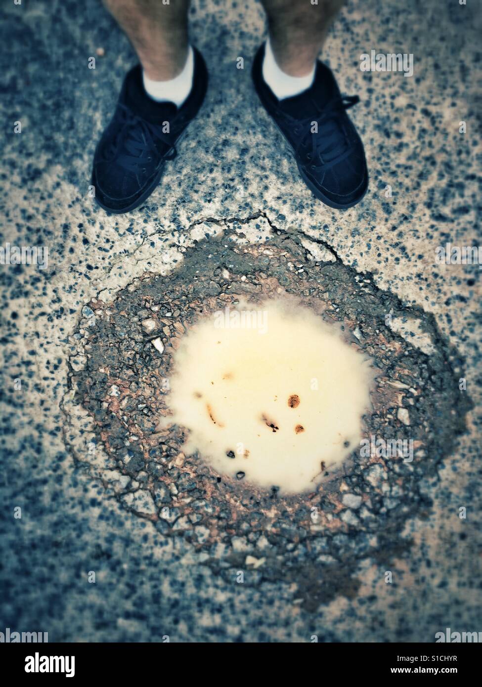 Puddle pothole hi-res stock photography and images - Alamy