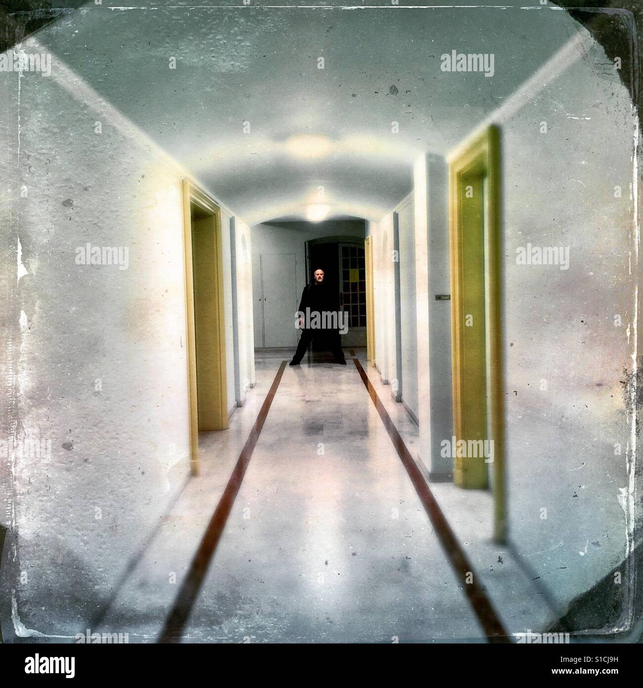Doors at the end of hallway hi-res stock photography and images - Alamy