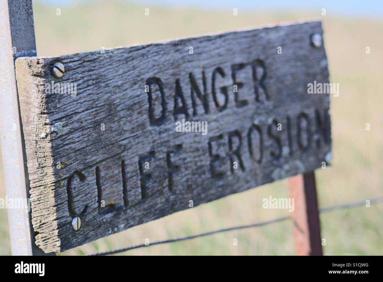 Weathered warning hi-res stock photography and images - Alamy