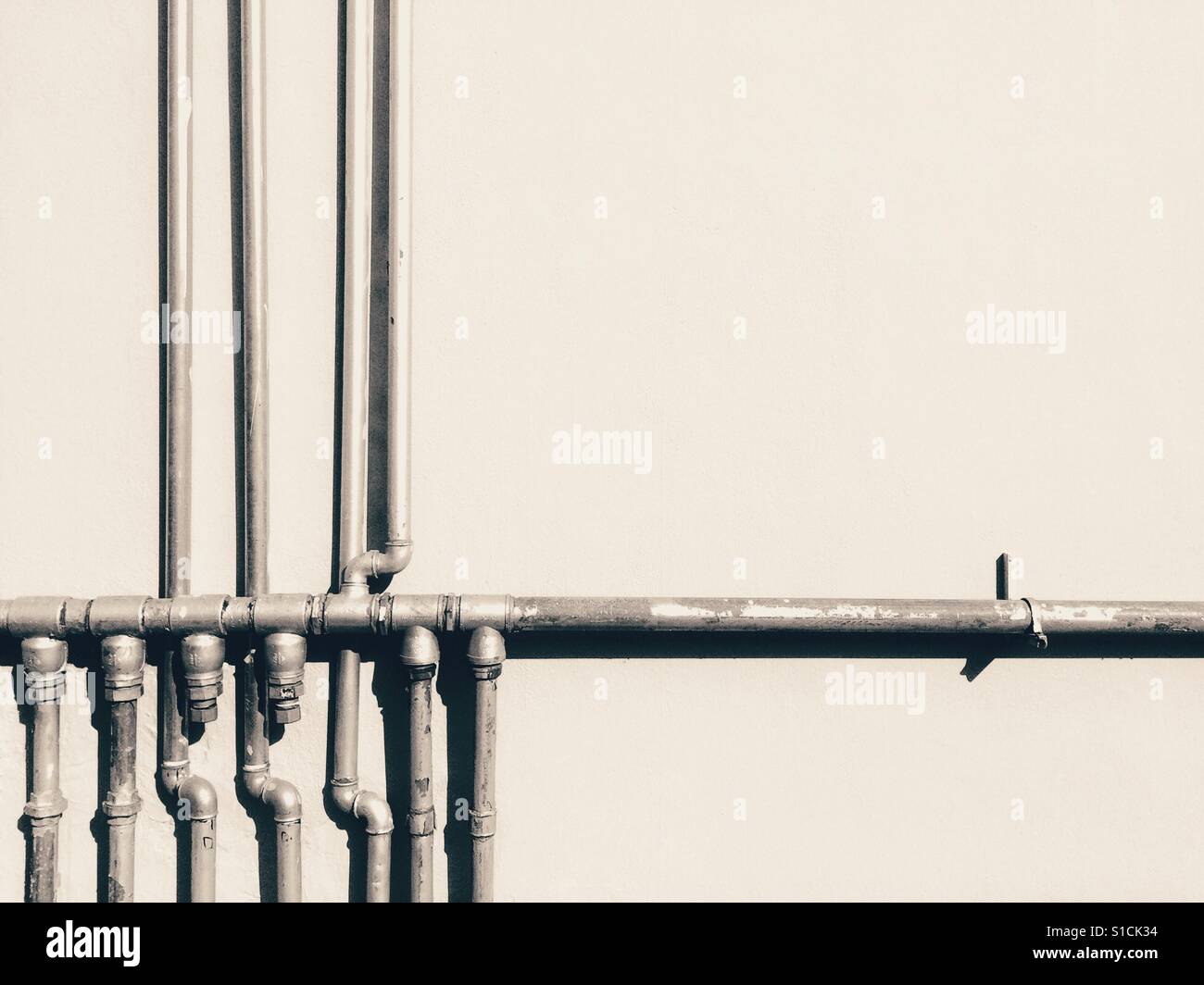 Wall piping hi-res stock photography and images - Alamy