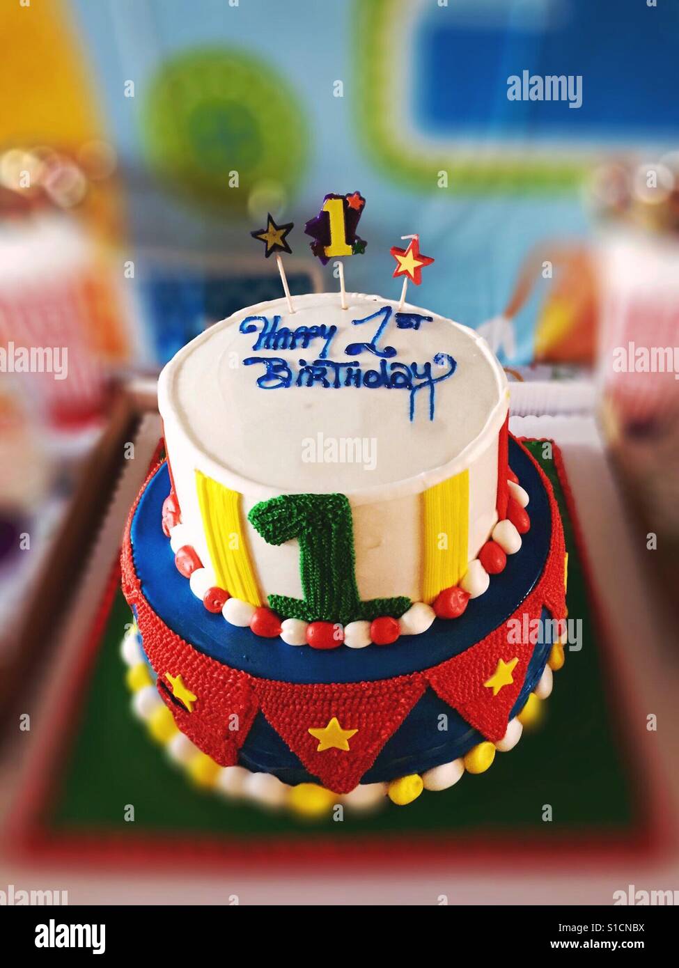 First birthday colorful circus themed cake Stock Photo - Alamy