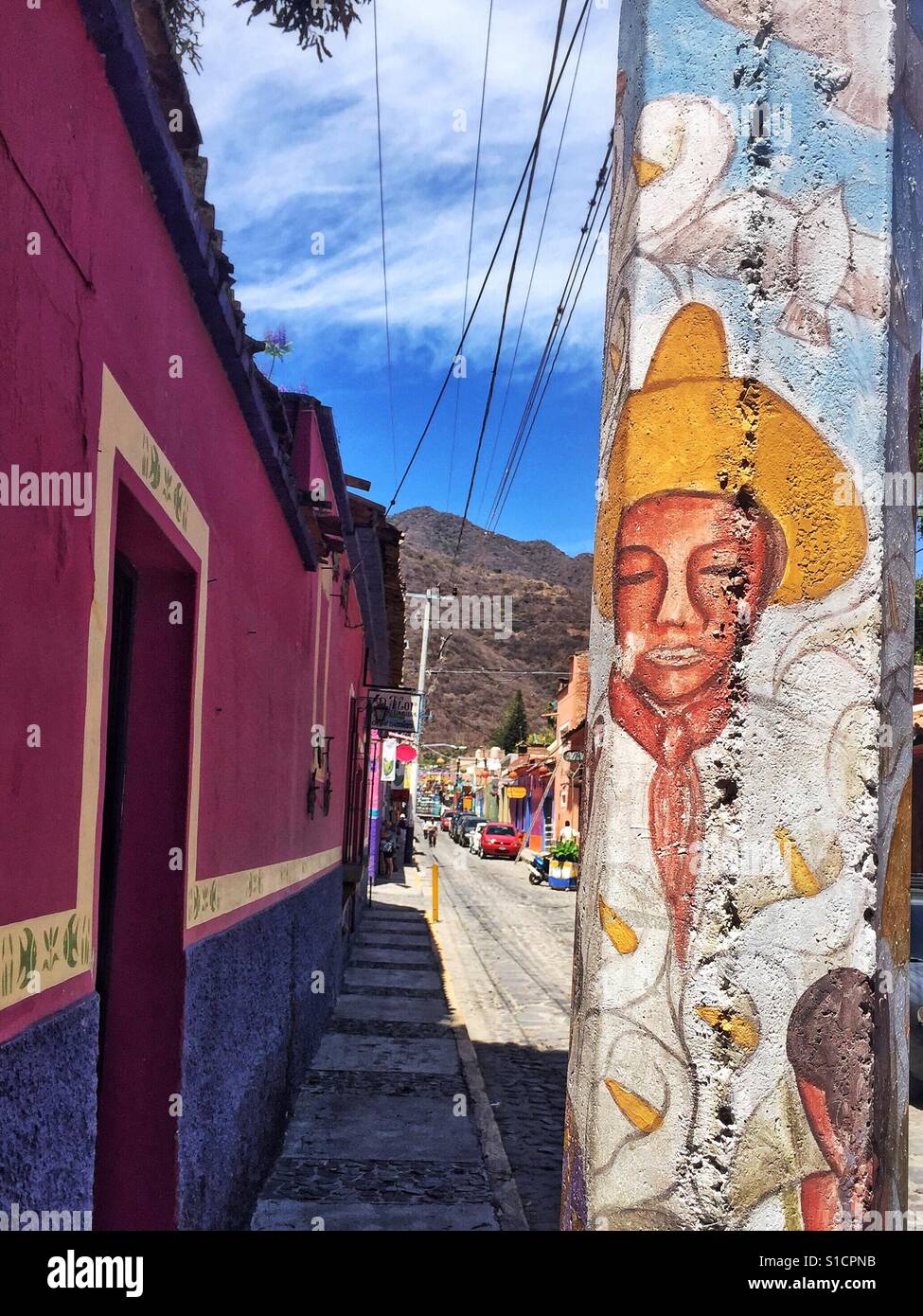 A painted power pole adds an artistic touch to colorful Ajijic, Mexico ...