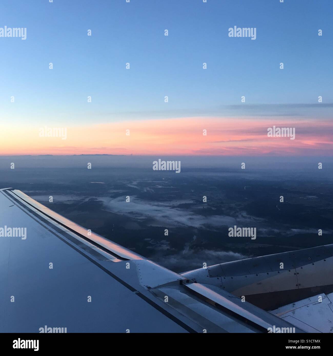 Airplane over landscape airplane hi-res stock photography and images ...