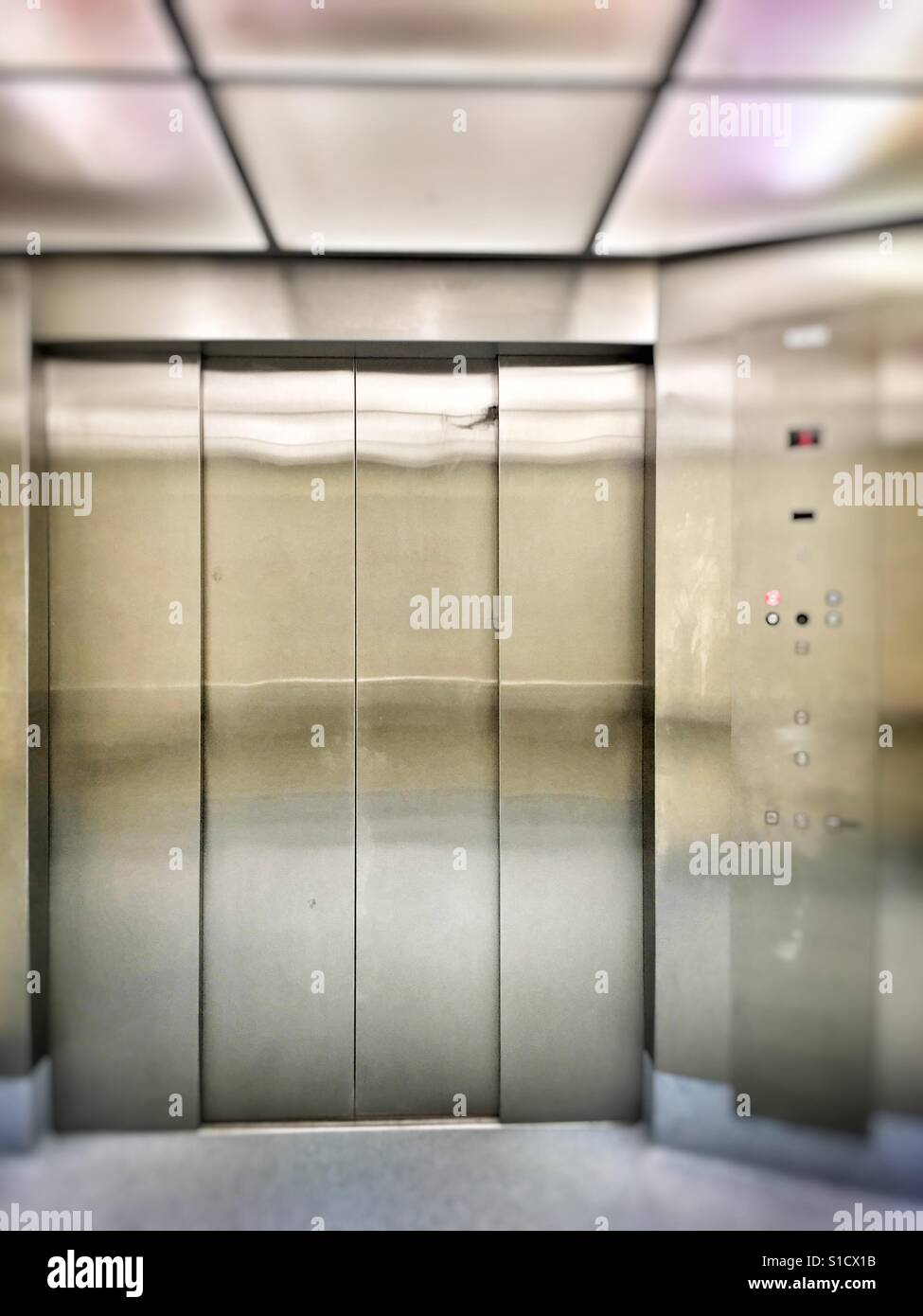 Inside a big elevator Stock Photo - Alamy