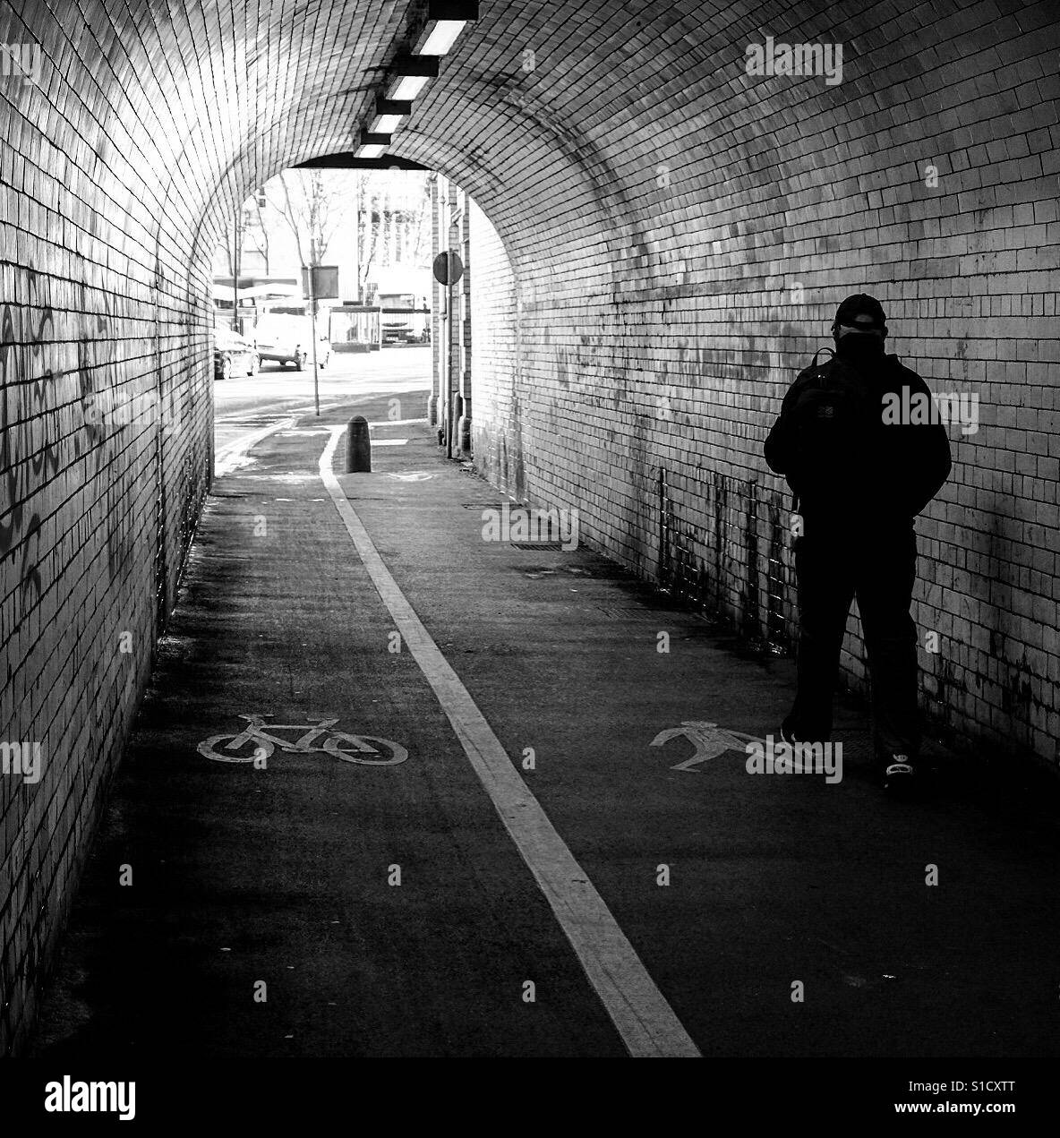 Walking under subway Black and White Stock Photos & Images - Alamy