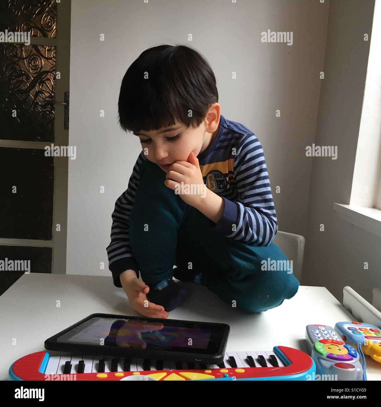 Young boy and his apple hi-res stock photography and images - Alamy
