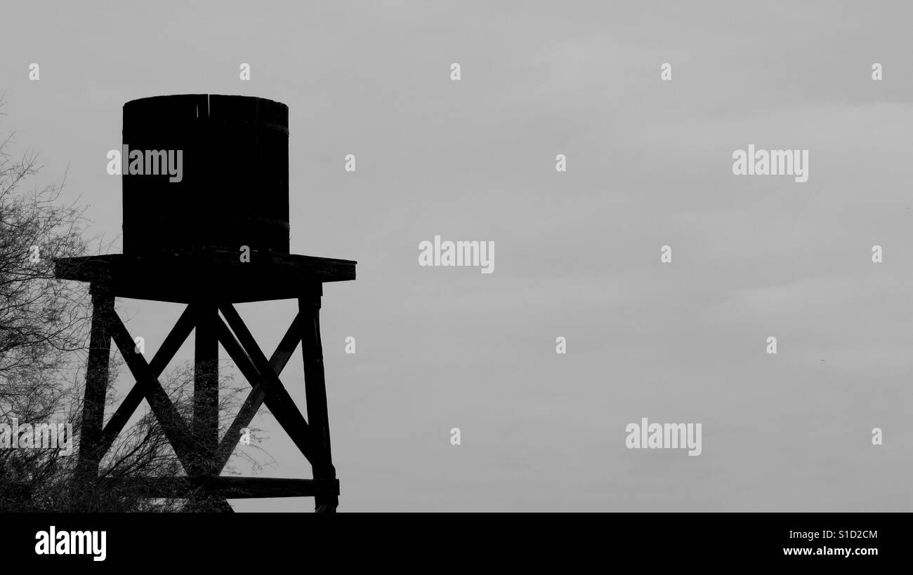 Water tower silhouette on white background Stock Photo - Alamy
