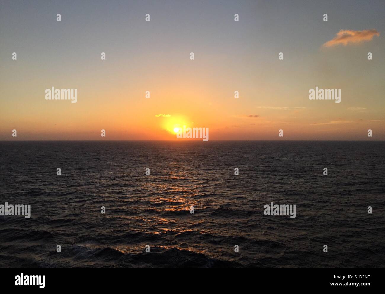 Golden Orange Sunset Over Ocean Stock Photo - Alamy
