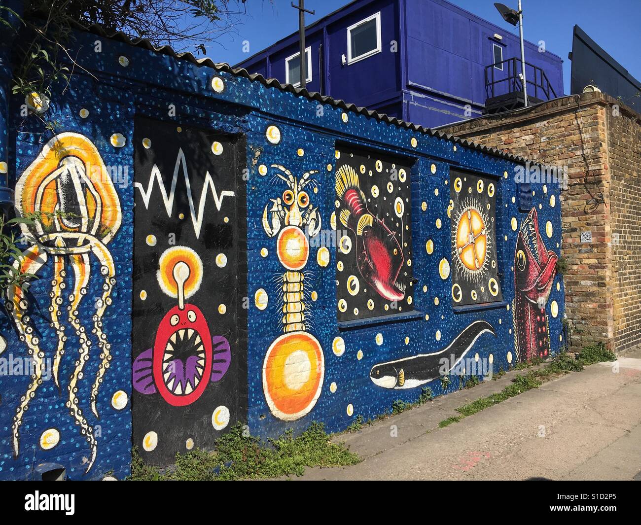 Sea creature themed graffiti in London's dockland Stock Photo - Alamy