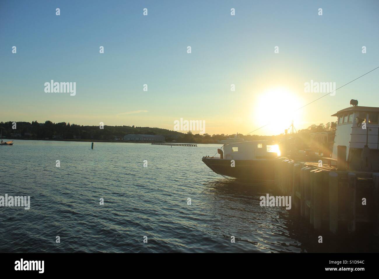 Harbour at sunset Stock Photo - Alamy