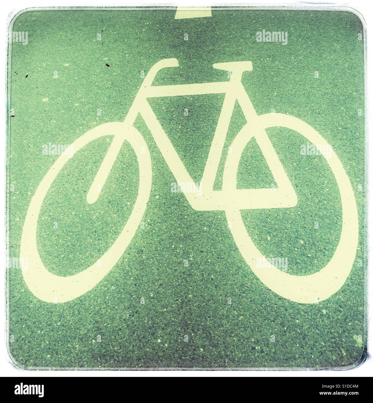 Detail Photo of a bicycle Symbol on a Street Stock Photo - Alamy