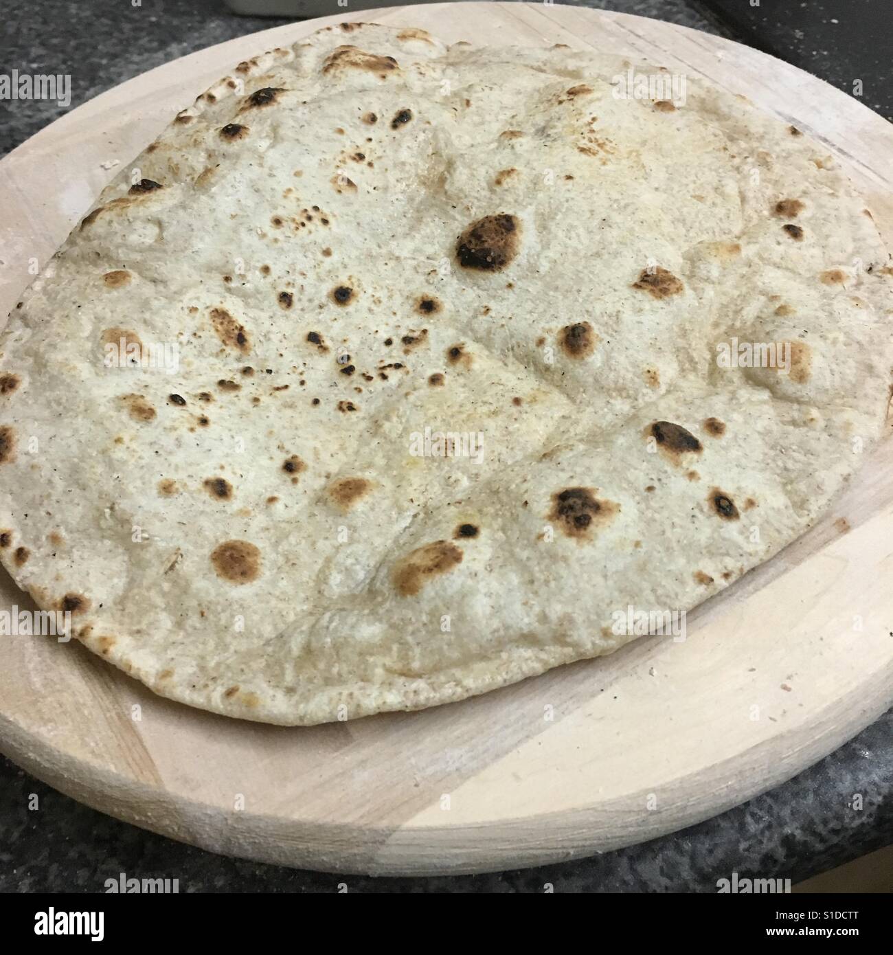 Roti flatbread hi-res stock photography and images - Alamy