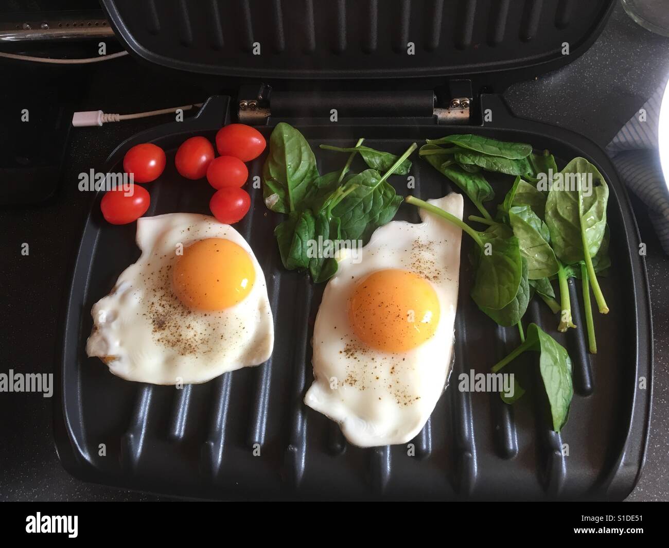 Breakfast on the grill Stock Photo - Alamy
