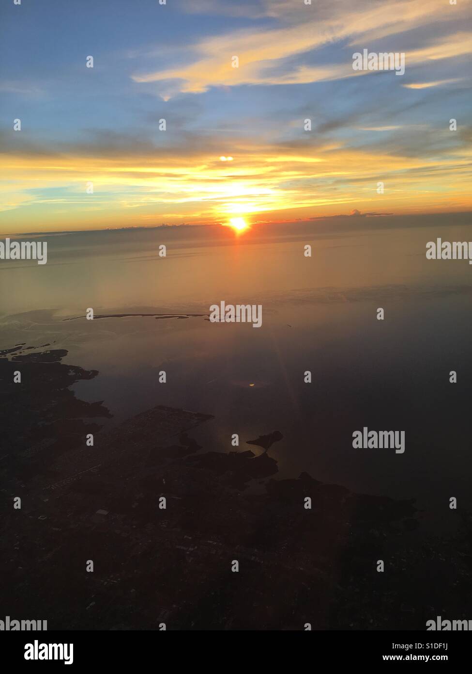 Sunset over Tampa, Florida from a plane Stock Photo - Alamy