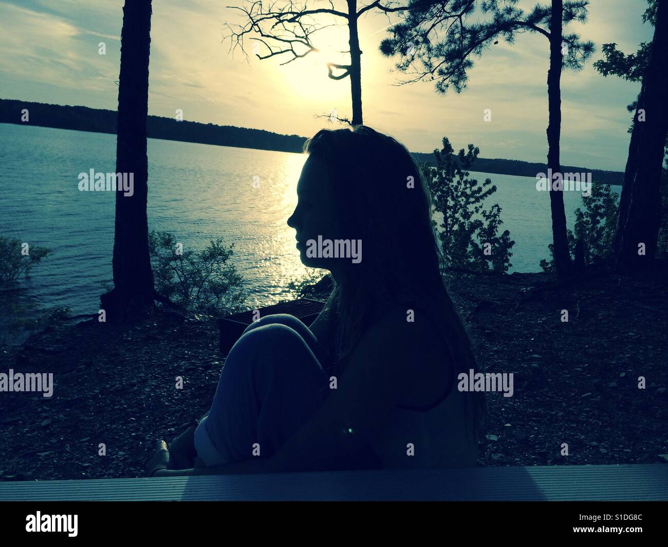 Sunset girl Stock Photo - Alamy