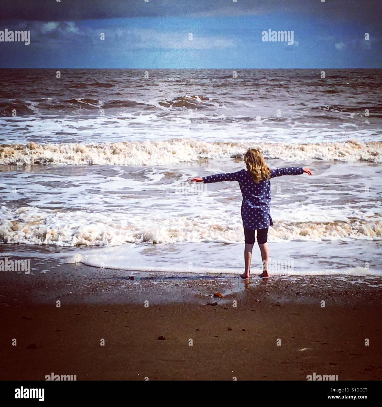 Child on the beach Stock Photo - Alamy