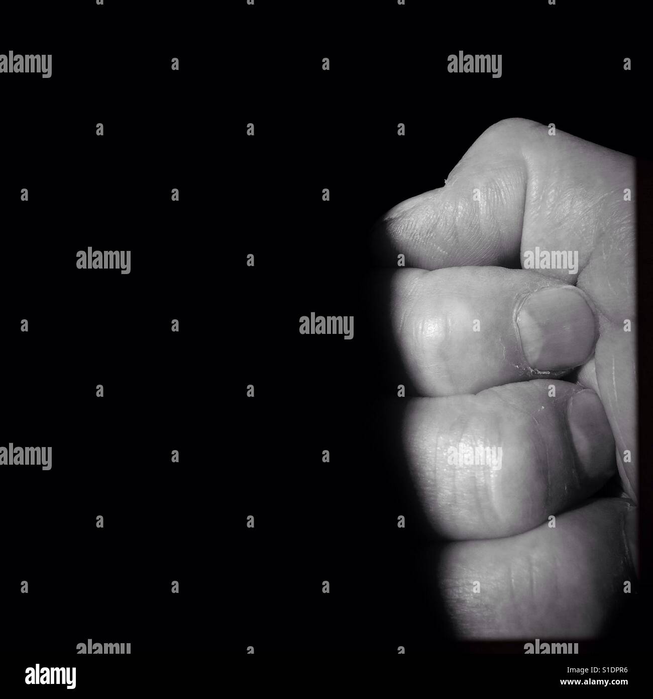 Black-and-white image of a male hand making a fist Stock Photo - Alamy