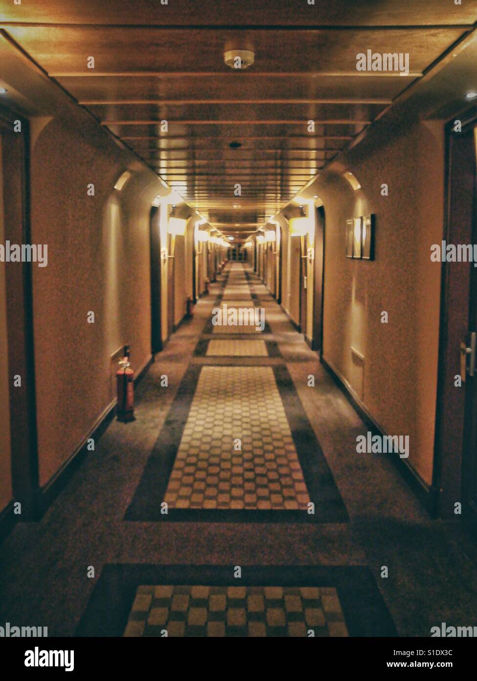 Empty hotel corridor Stock Photo - Alamy