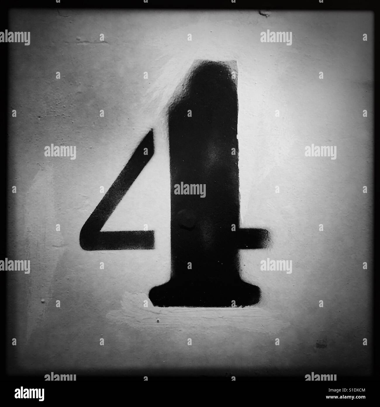 Number 4 painted with stencil on the wall Stock Photo - Alamy