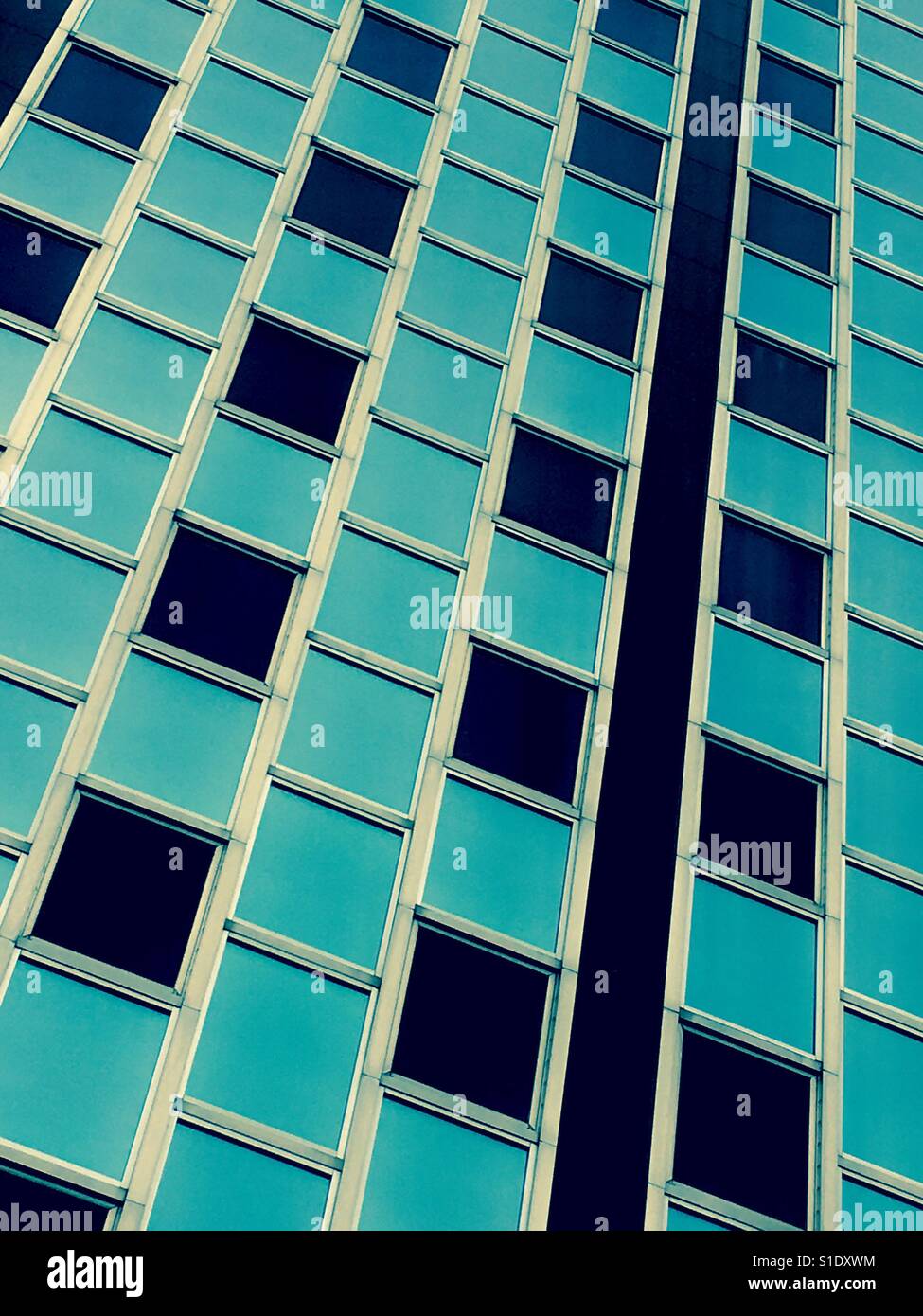 Tall blue office building Stock Photo - Alamy