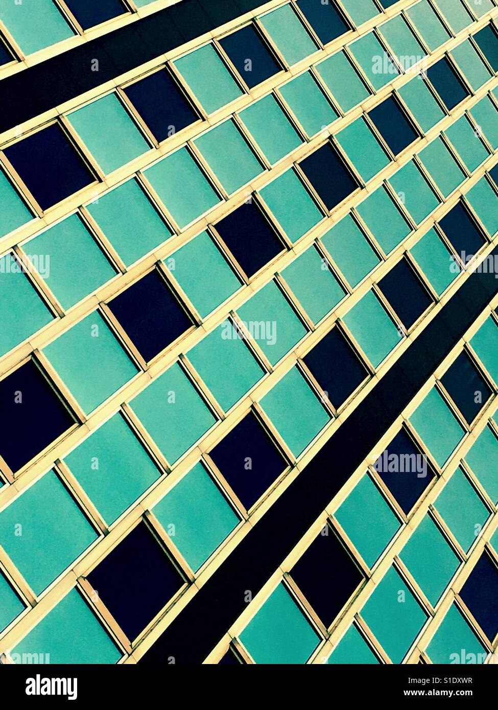 Tall blue office building Stock Photo - Alamy