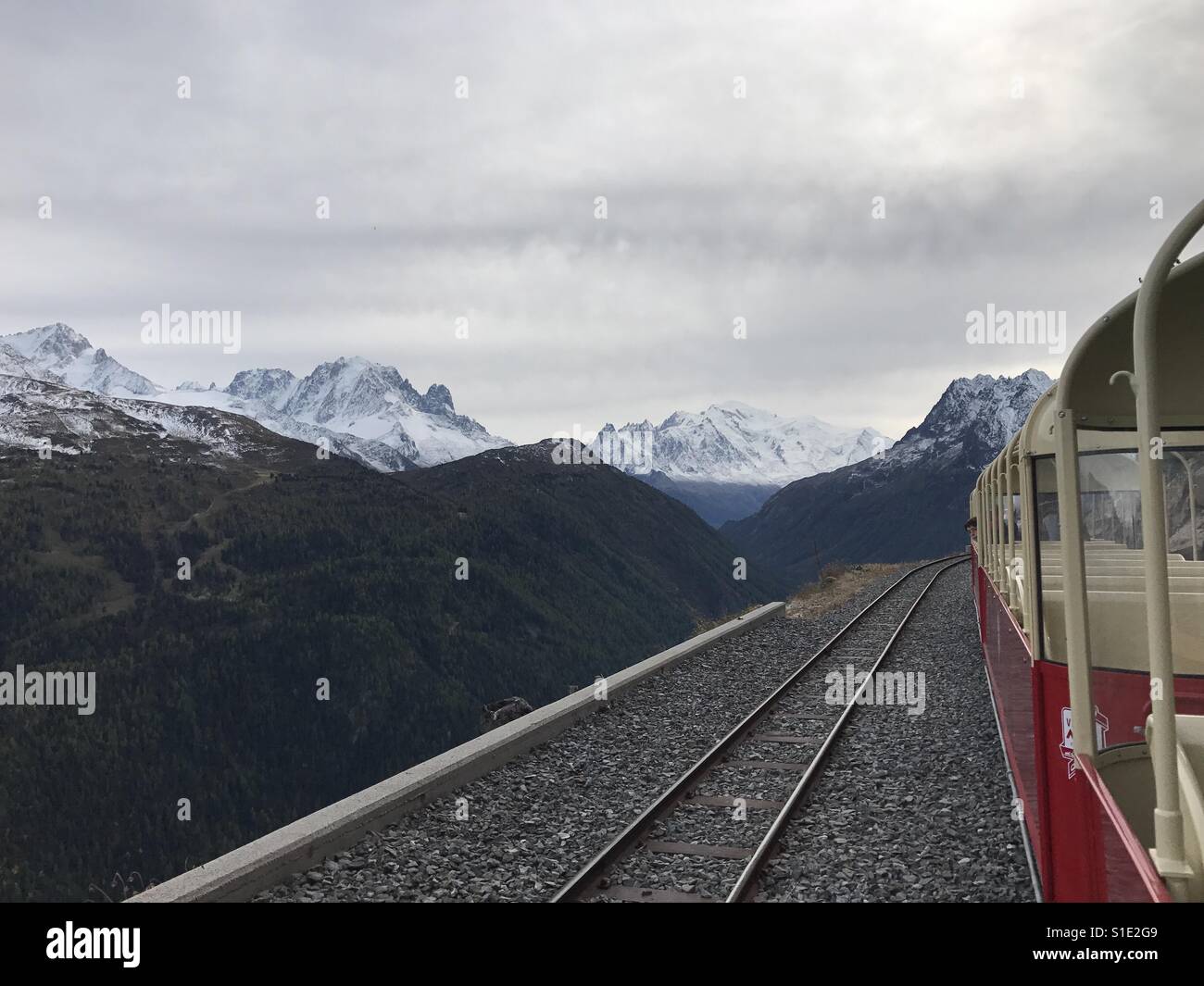 Train running through the mountains hi-res stock photography and images ...