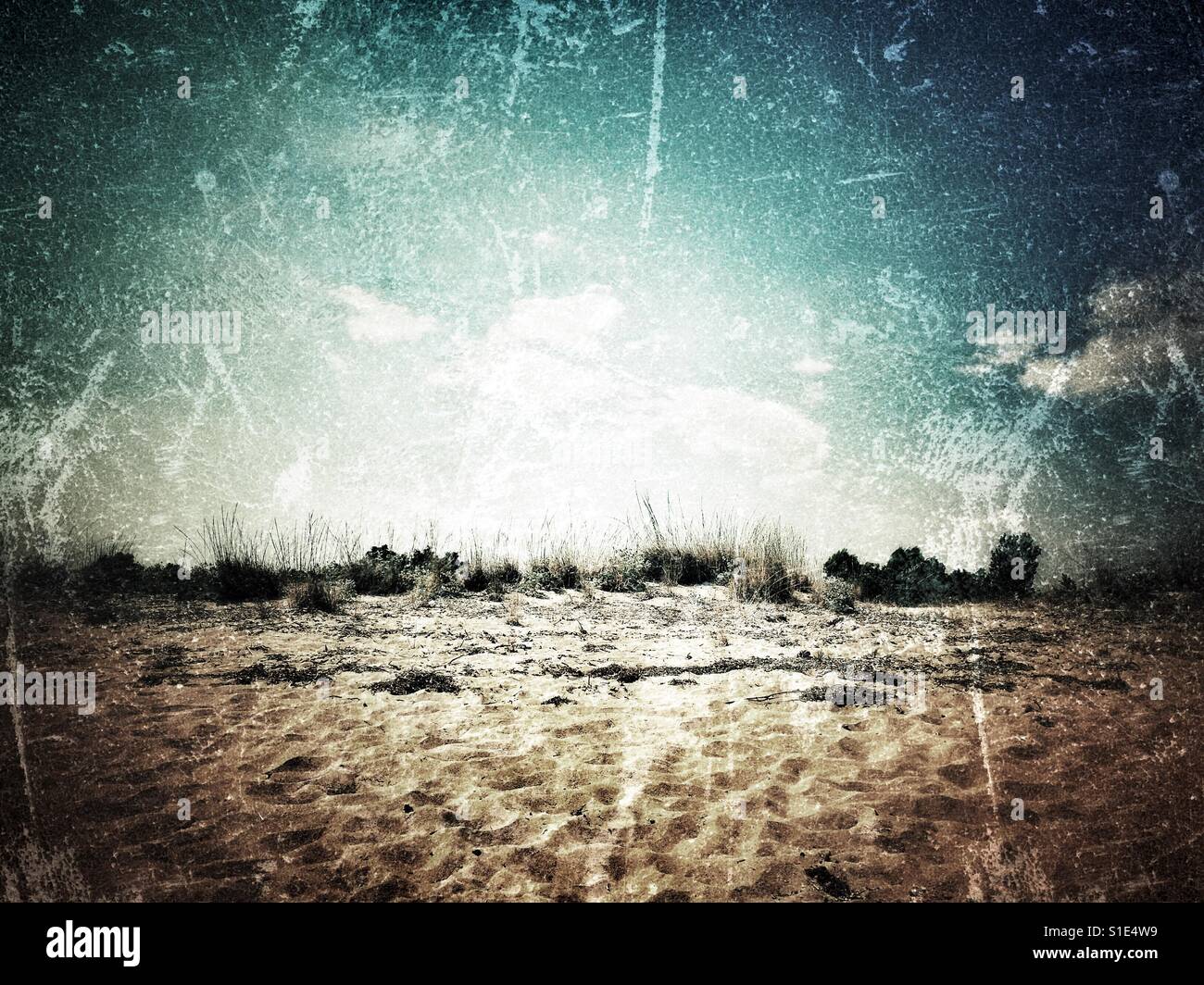 Remote sandy area in grunge Stock Photo - Alamy