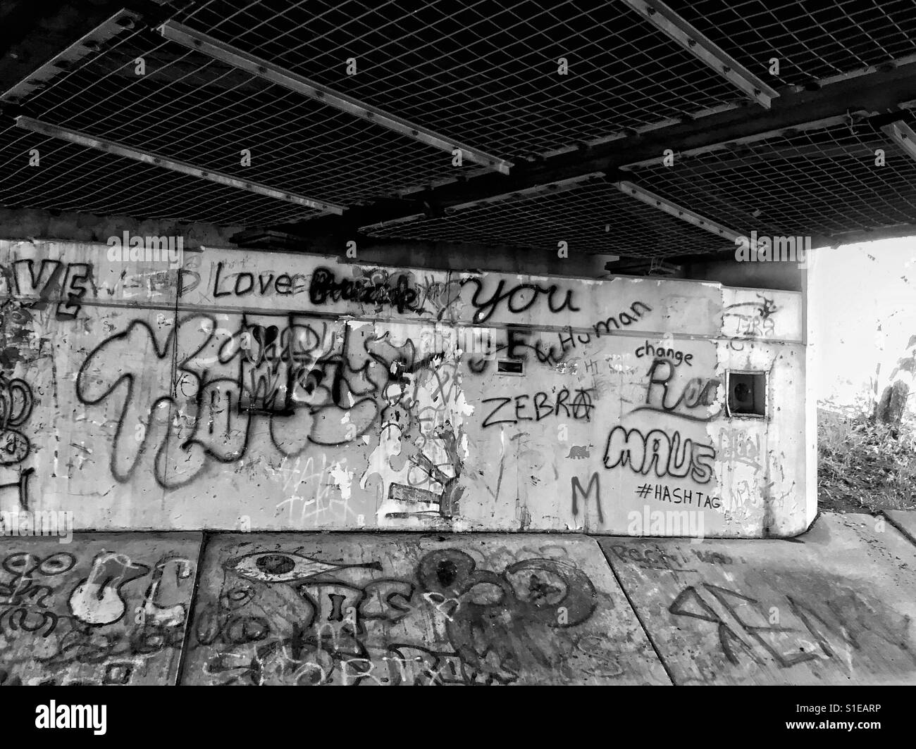 Graffiti under a bridge hi-res stock photography and images - Alamy