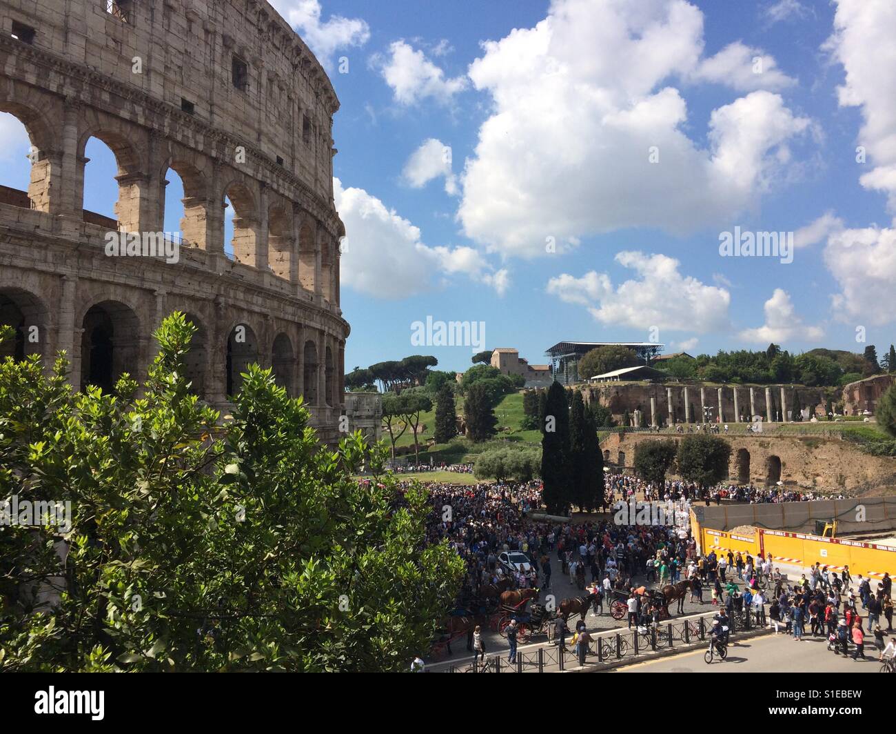 This is the Coliseum in Rome on a busy summer day Stock Photo - Alamy