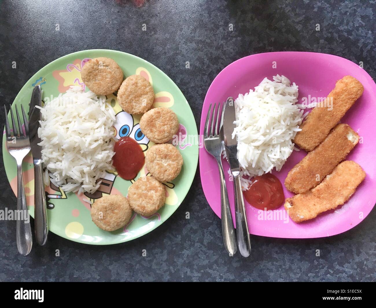 Children's dinner plates Stock Photo - Alamy