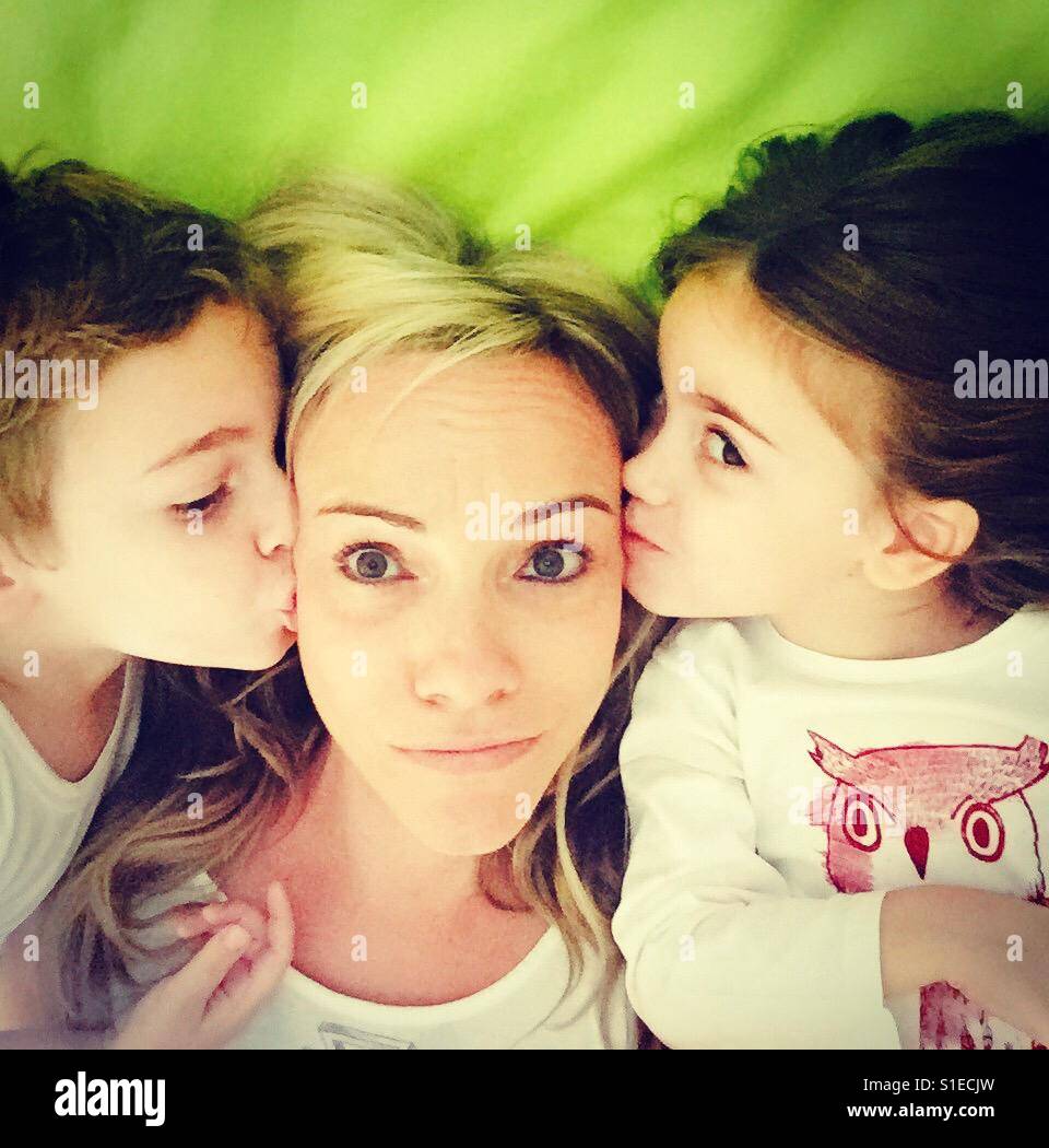 Mom with kids Stock Photo - Alamy