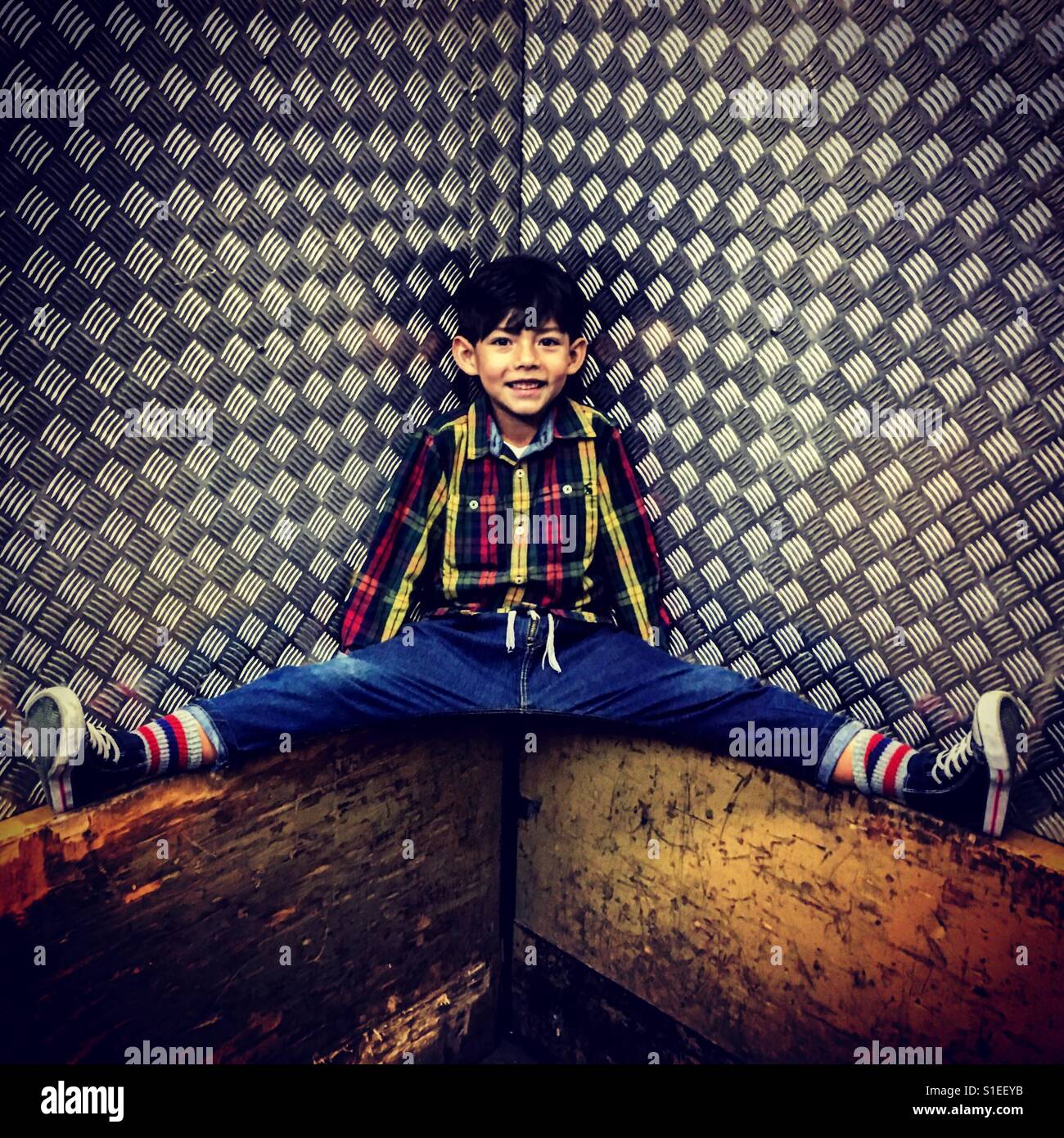 young boy doing the split with his legs Stock Photo - Alamy
