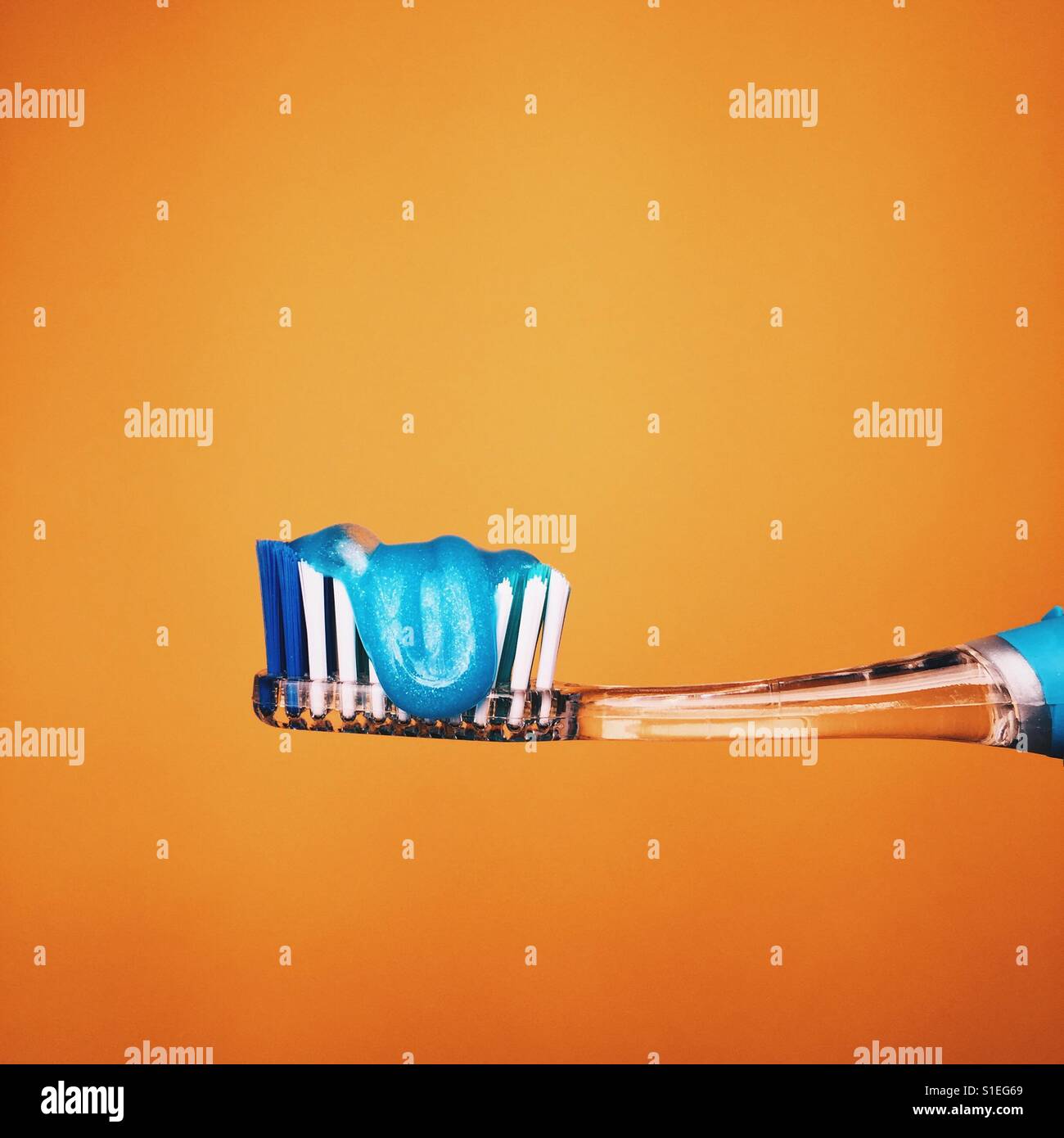 Toothbrush blue bristles toothpaste hi-res stock photography and images ...