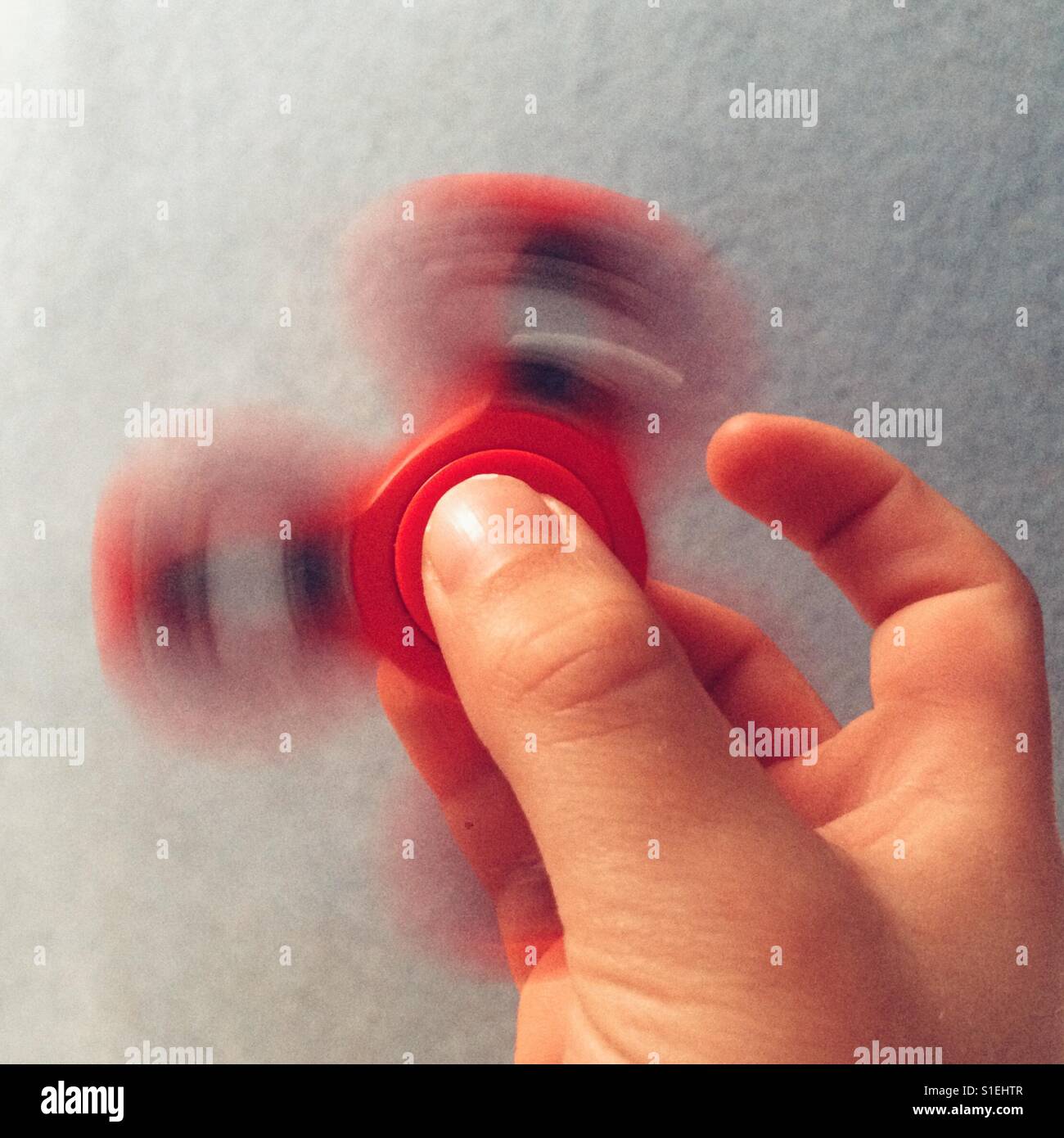 Fidget spinner toy Stock Photo - Alamy