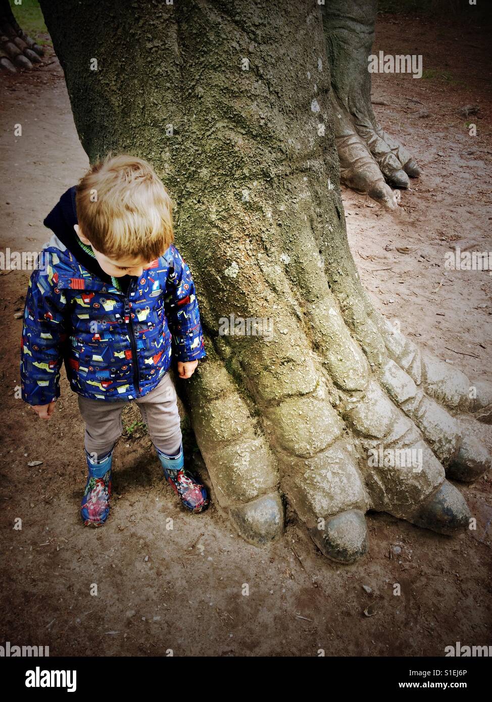 Big foot little foot Stock Photo - Alamy