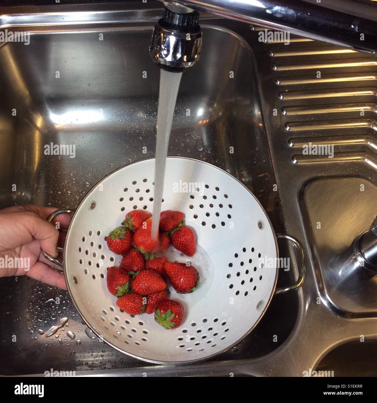 Strawberries wash hi-res stock photography and images - Alamy