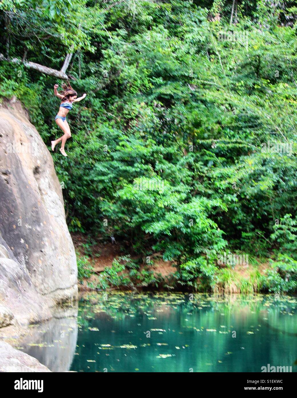 Girl Cliff Jumping Photography