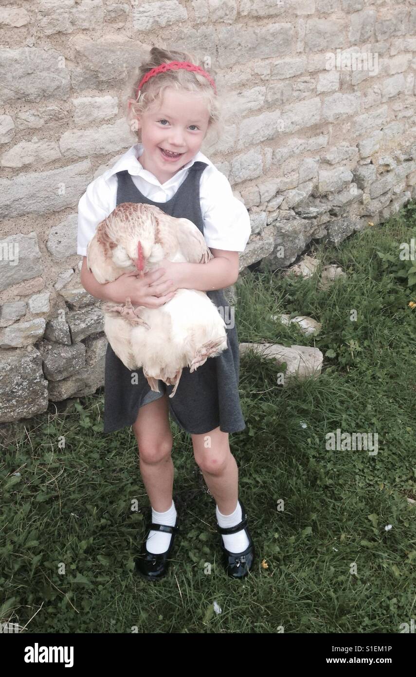 Girl with hen hi-res stock photography and images - Alamy