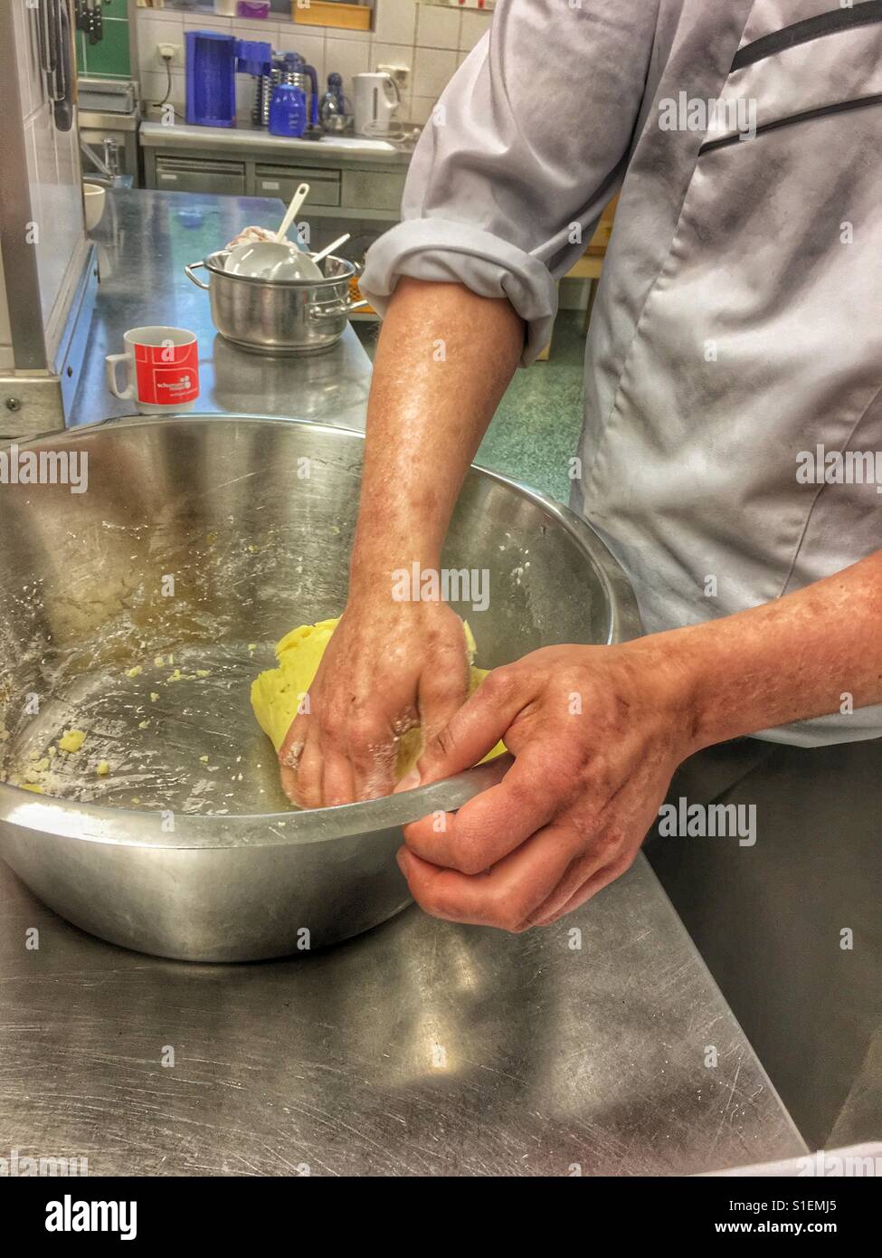 A young cook preparing food Stock Photo - Alamy
