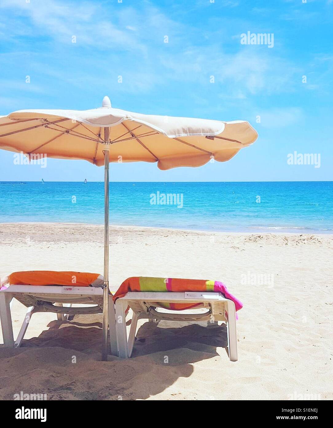 Sun loungers on the beach Stock Photo - Alamy