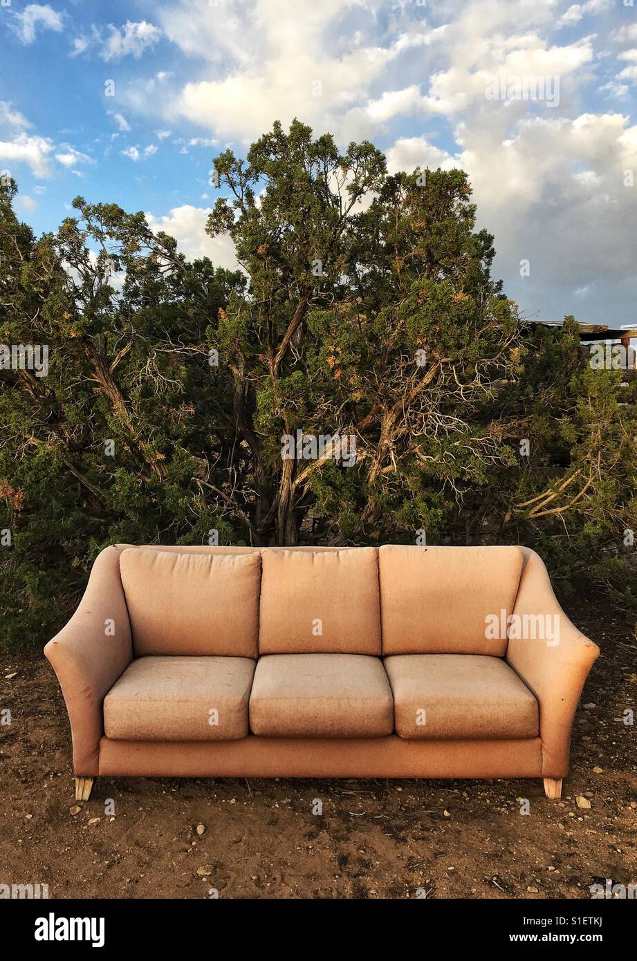 Old couch outside Stock Photo - Alamy