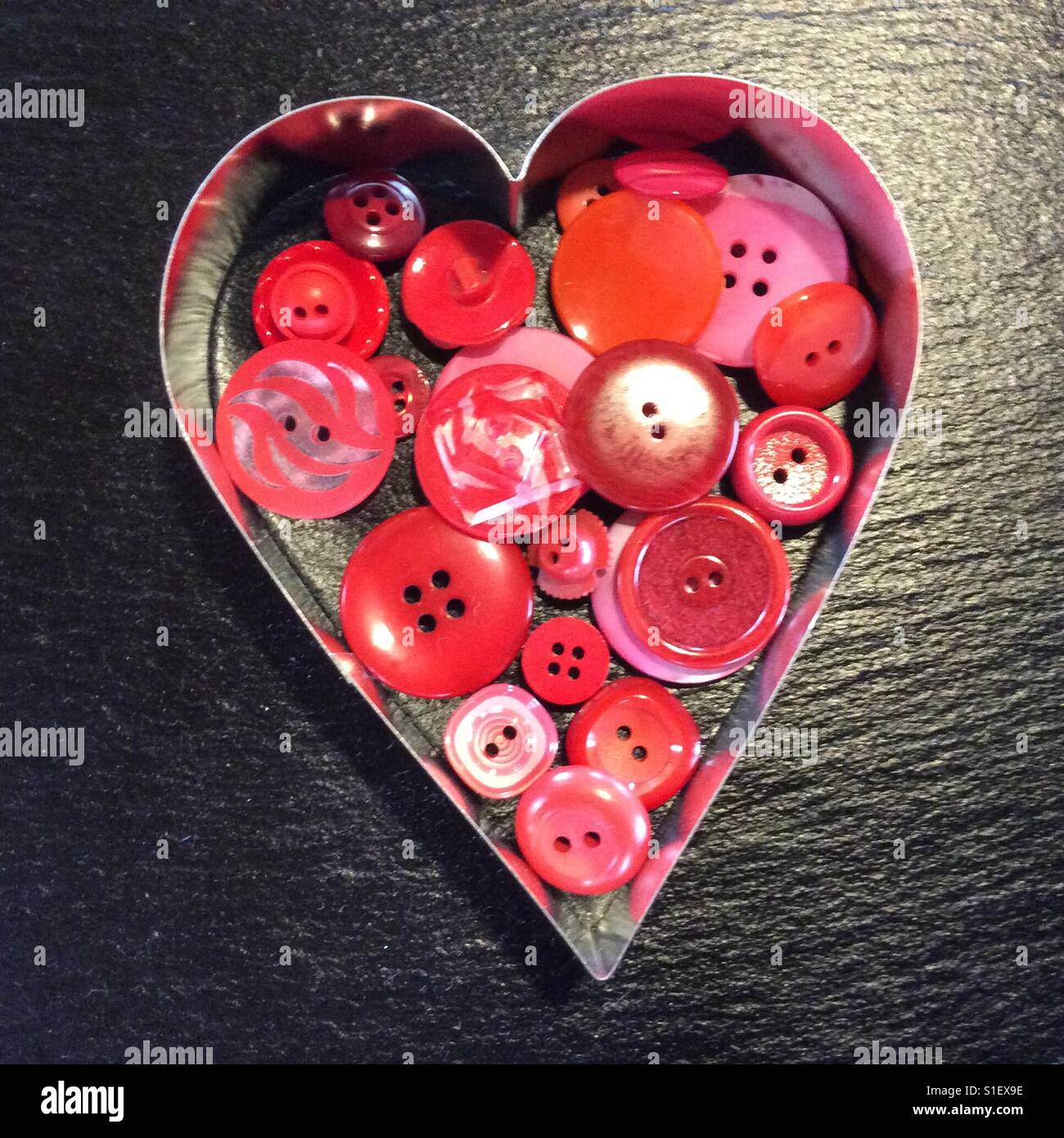 Button hearts hi-res stock photography and images - Alamy