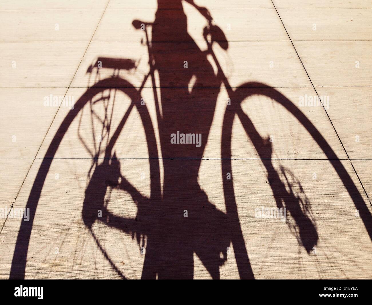 Shadow of man sitting hi-res stock photography and images - Alamy