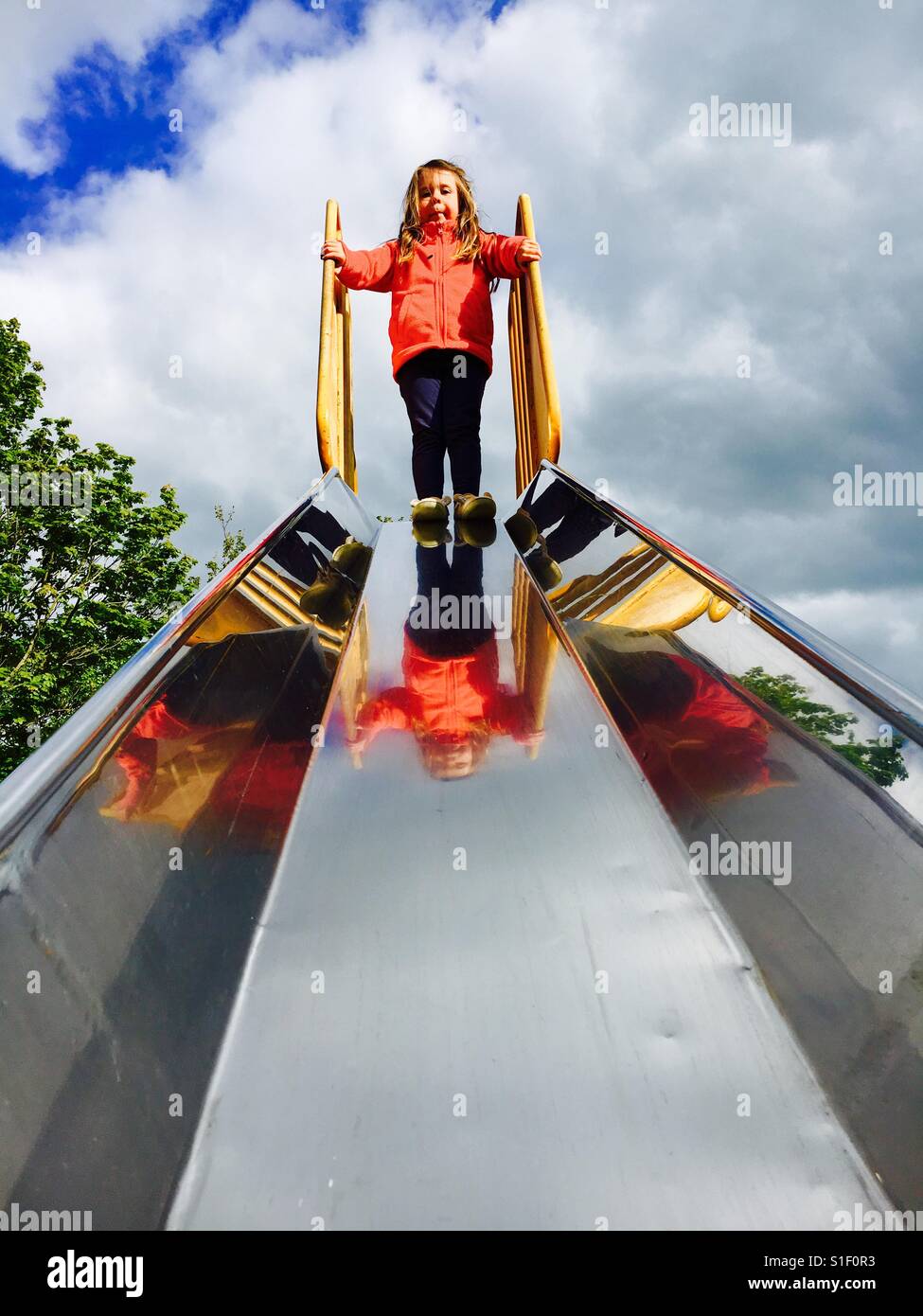 Girl slide hi-res stock photography and images - Alamy