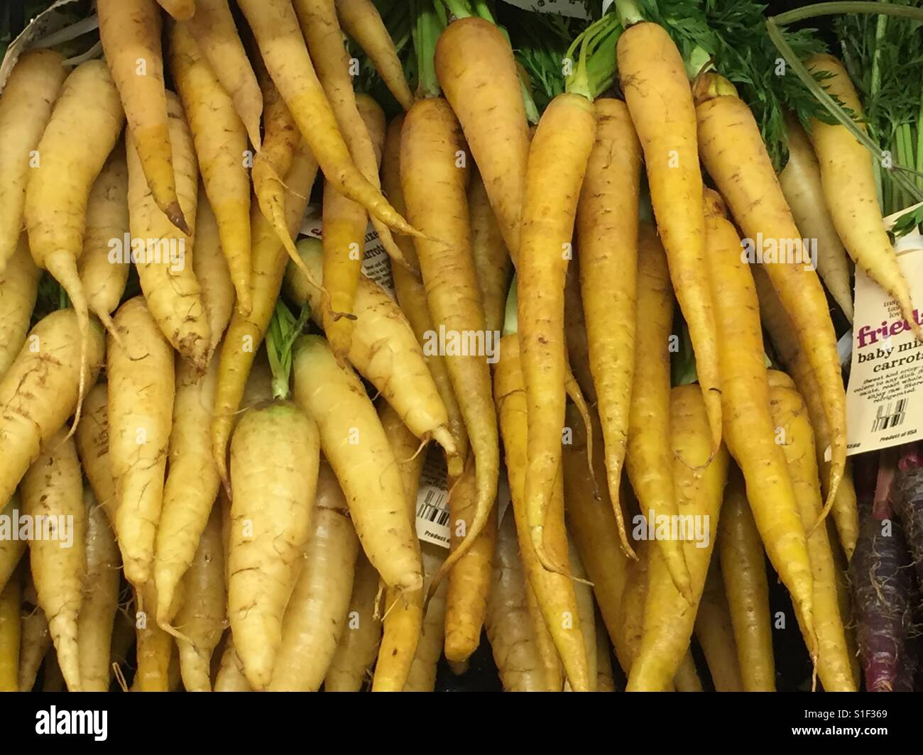 Yellow carrots hi-res stock photography and images - Alamy