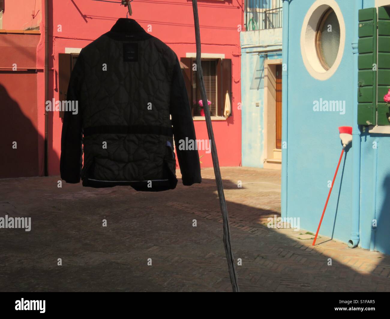 Hanging jacket hi-res stock photography and images - Alamy