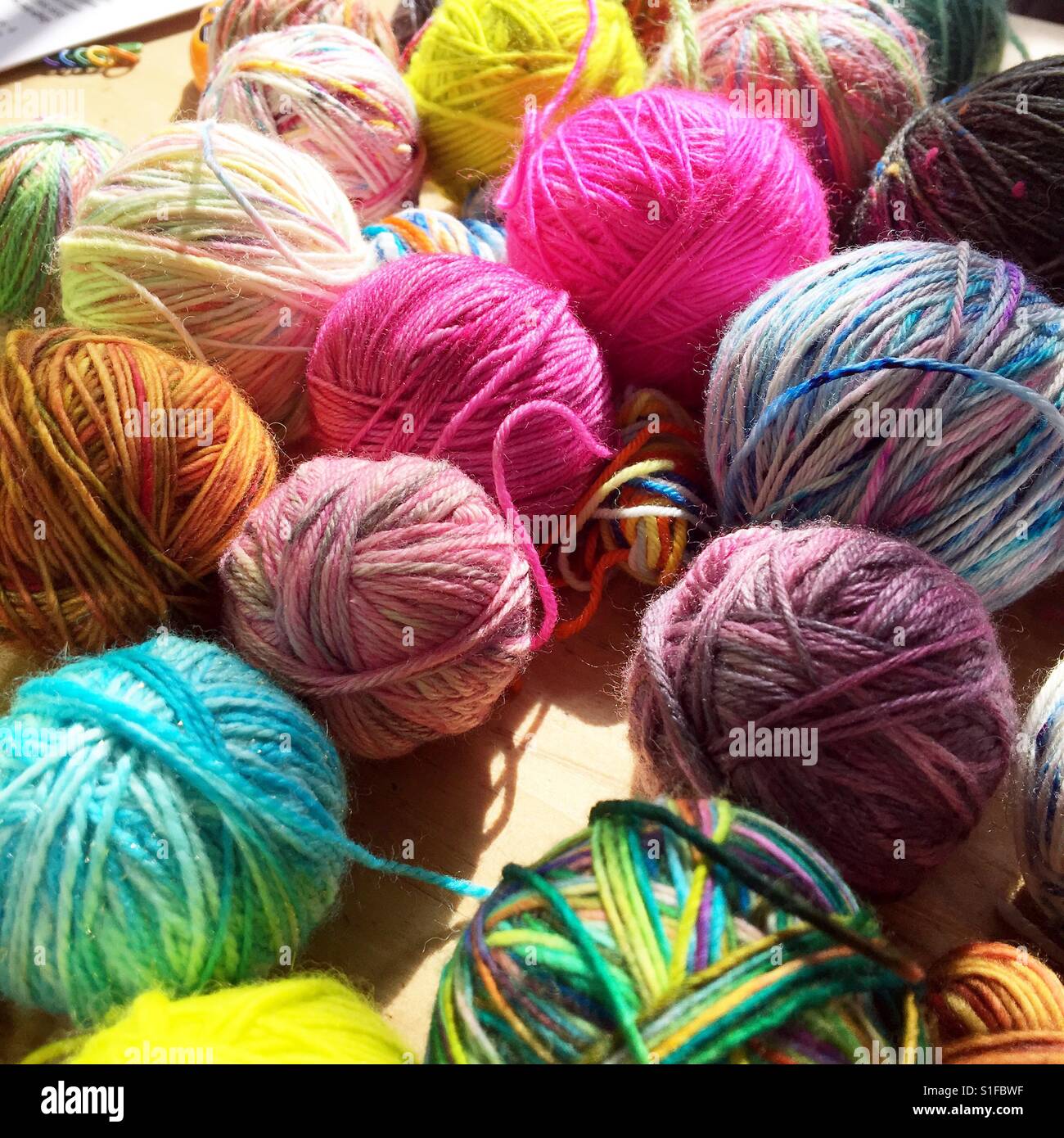 Selection of colourful balls of yarn Stock Photo - Alamy