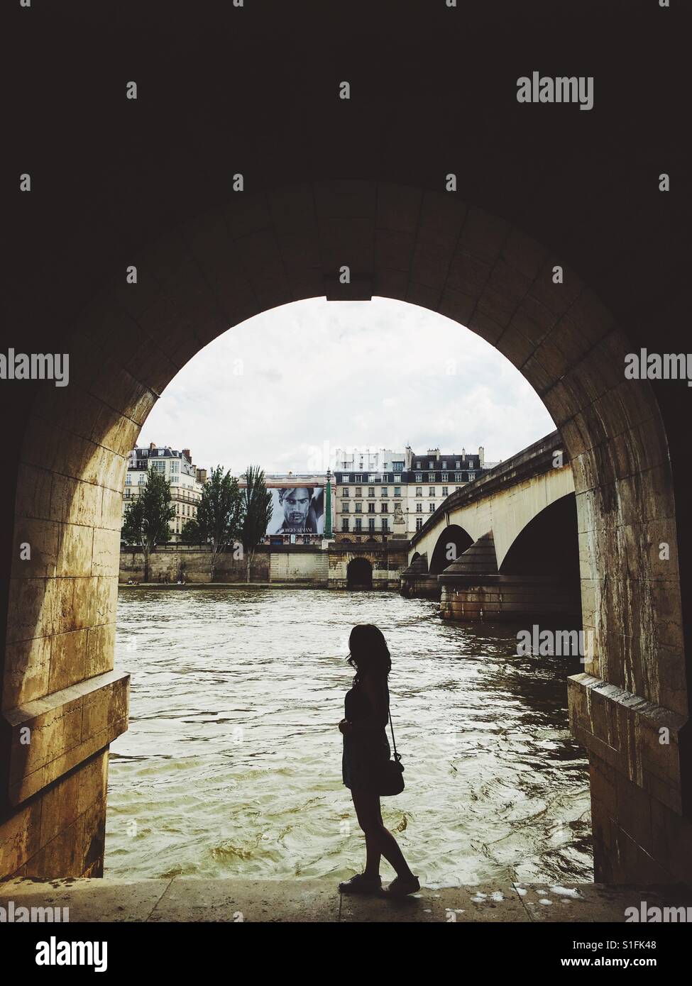 Girl in arch hi-res stock photography and images - Alamy