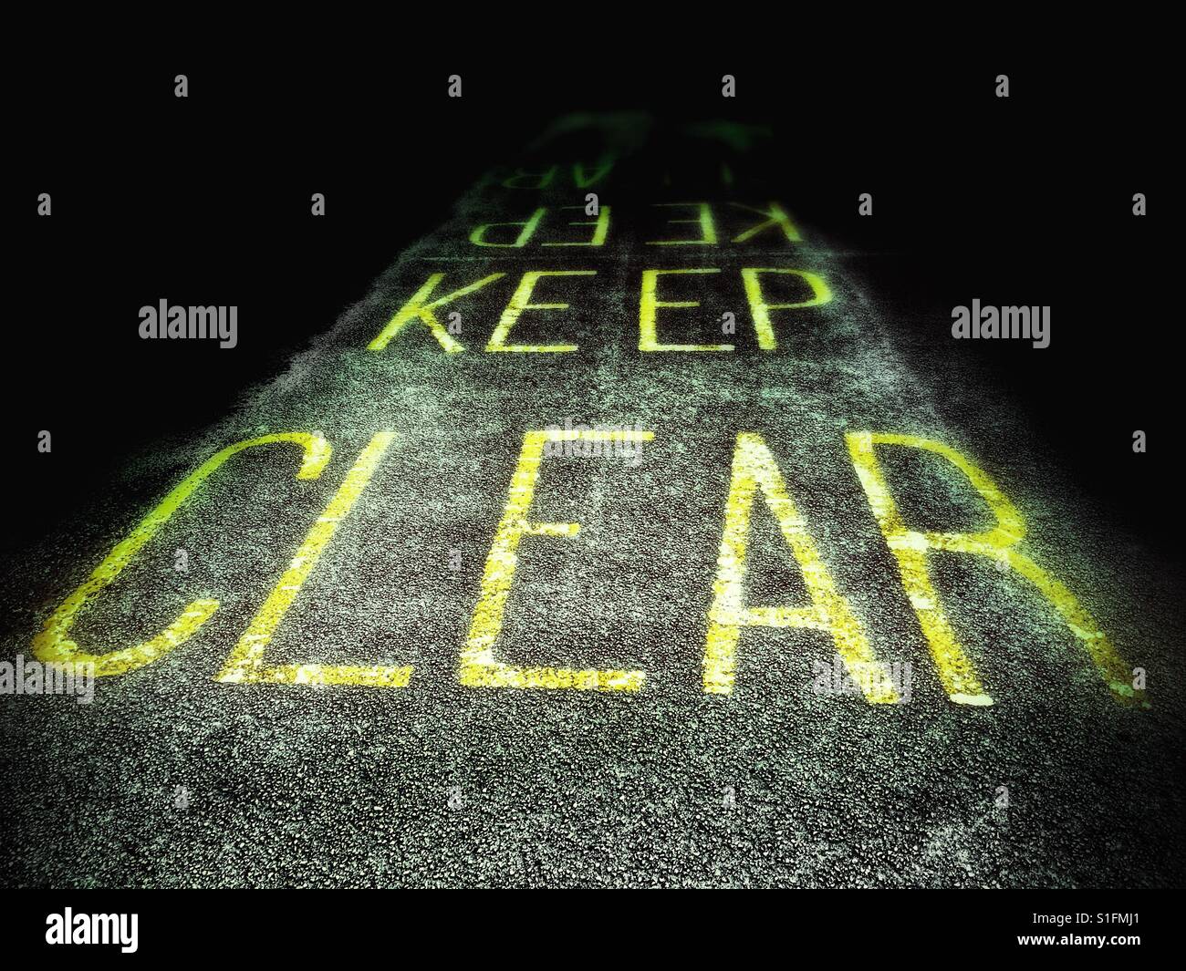 Keep clear road marking hi-res stock photography and images - Alamy